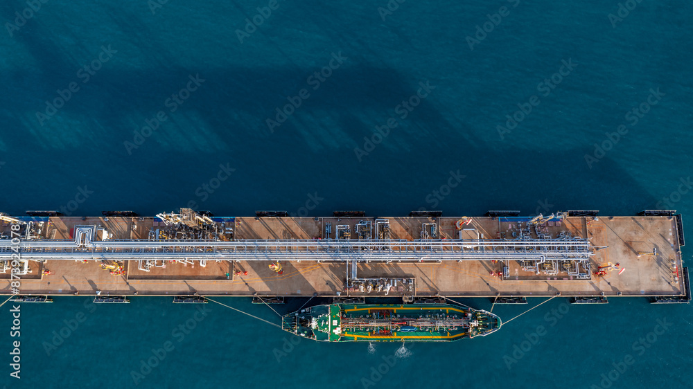 Aerial view oil tanker ship oil depot terminal storage petroleum ...