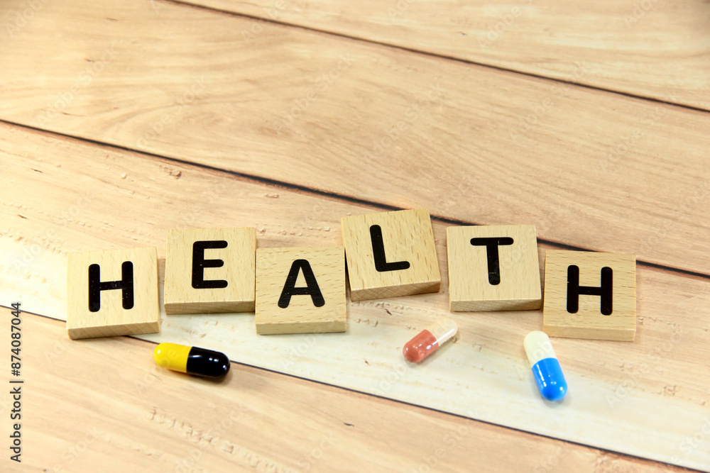 Short word english letter or text with pills on brown background.Copy ...