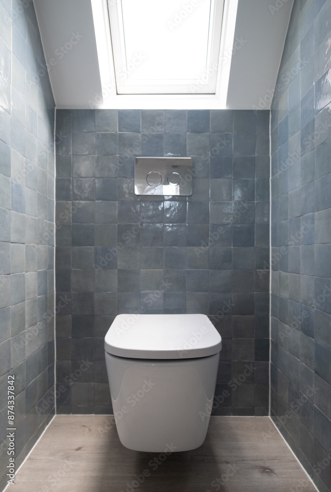 Small toilet in a loft conversion which makes clever use of eaves space ...