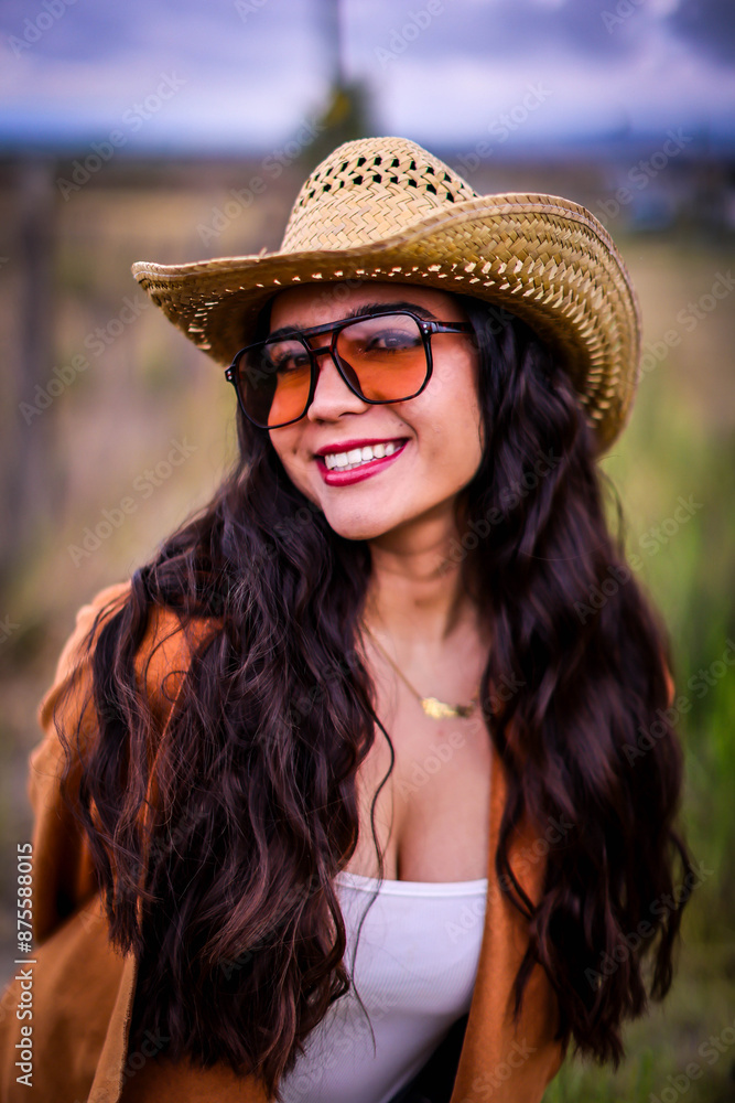Mexican, western cowgirl with a whip in a sheriff hat. Mexican con ...