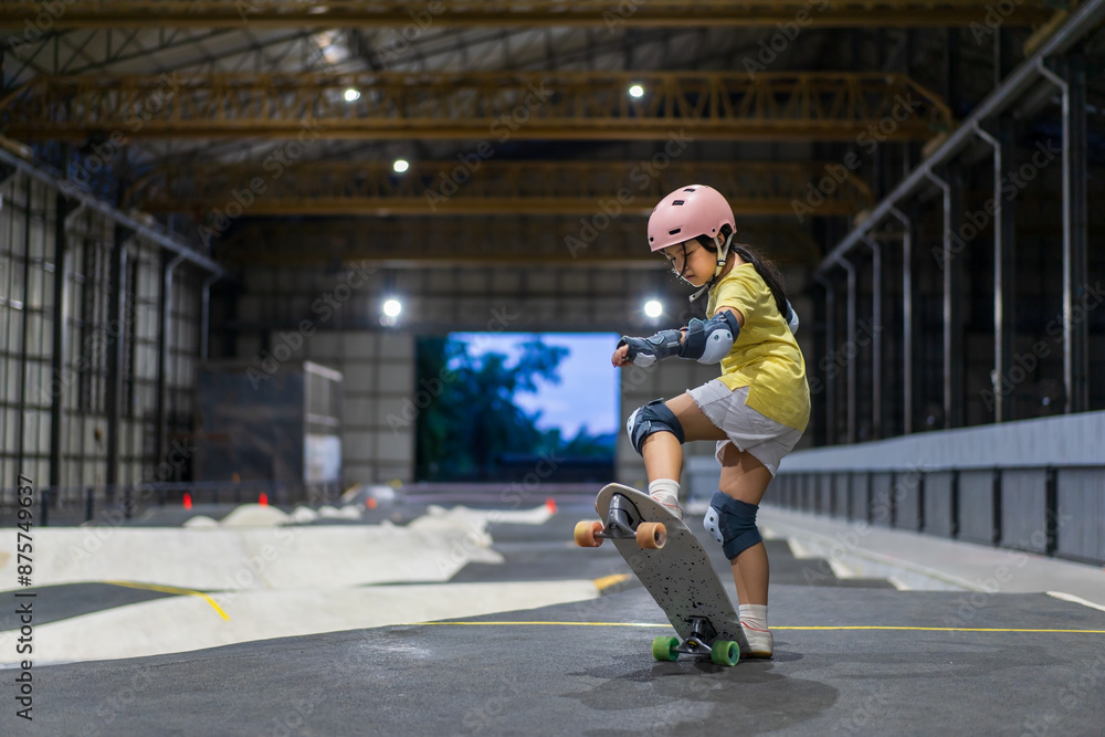 skater asian child or kid girl play skateboard or ride surf skate and ...