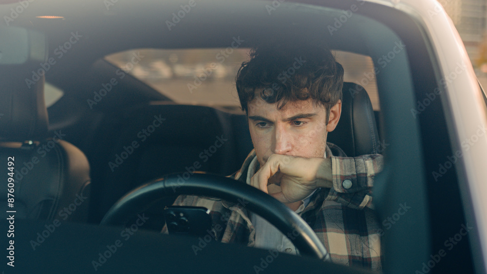 Displeased upset sad Caucasian man guy male driver car owner inside ...