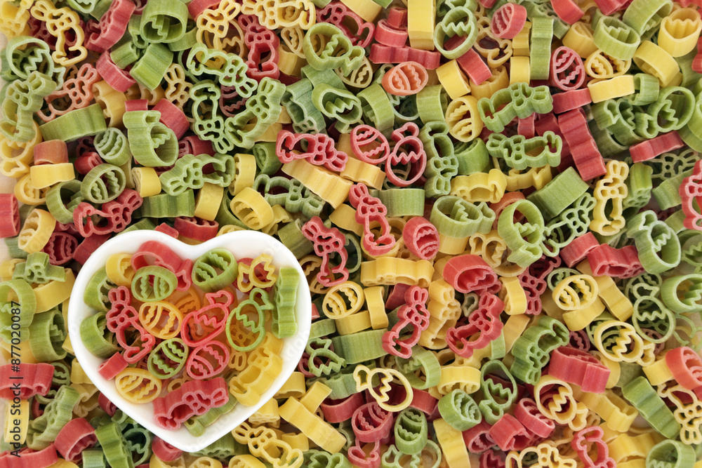 Italian tricolor uncooked Italian pasta food background with heart ...
