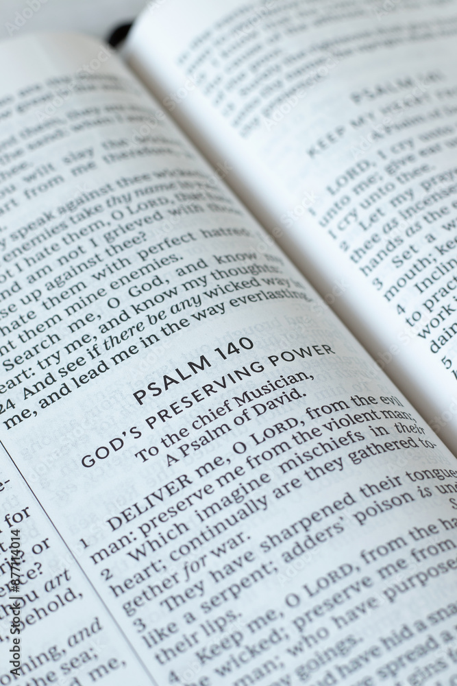 Psalm 140 verses in open holy bible book. Close-up. Christian biblical ...