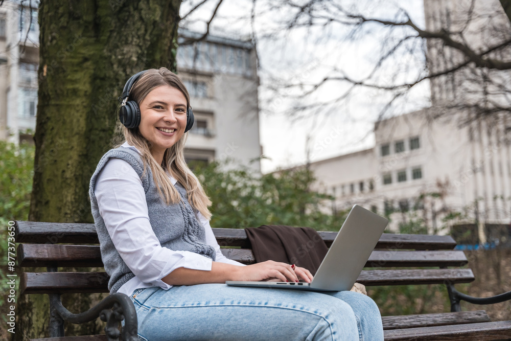Young business woman graphic designer professional working on laptop ...