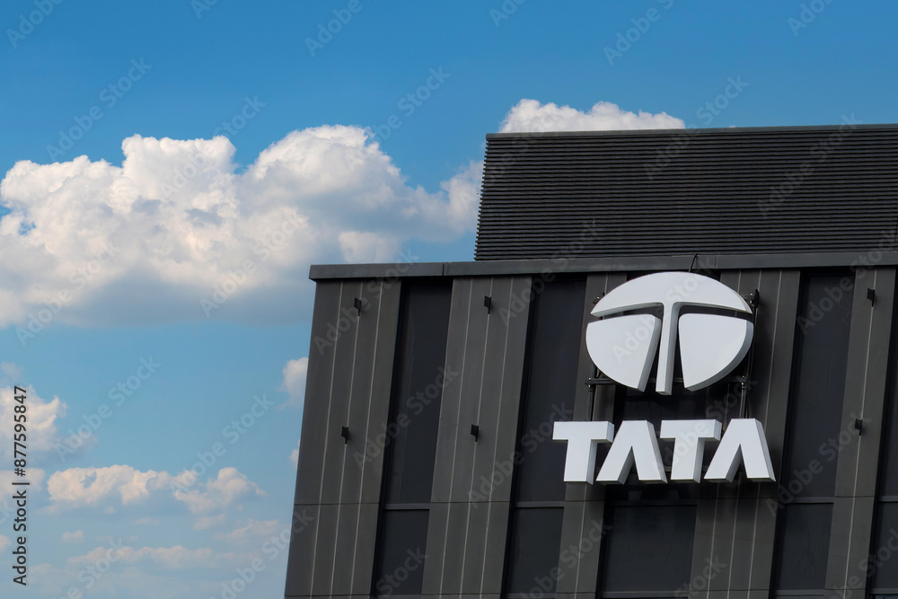 Tata logo on the top of company office. Tata Group is an Indian ...