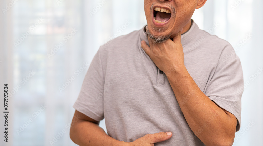 Sick senior man touching neck unwell coughing with sore throat pain ...