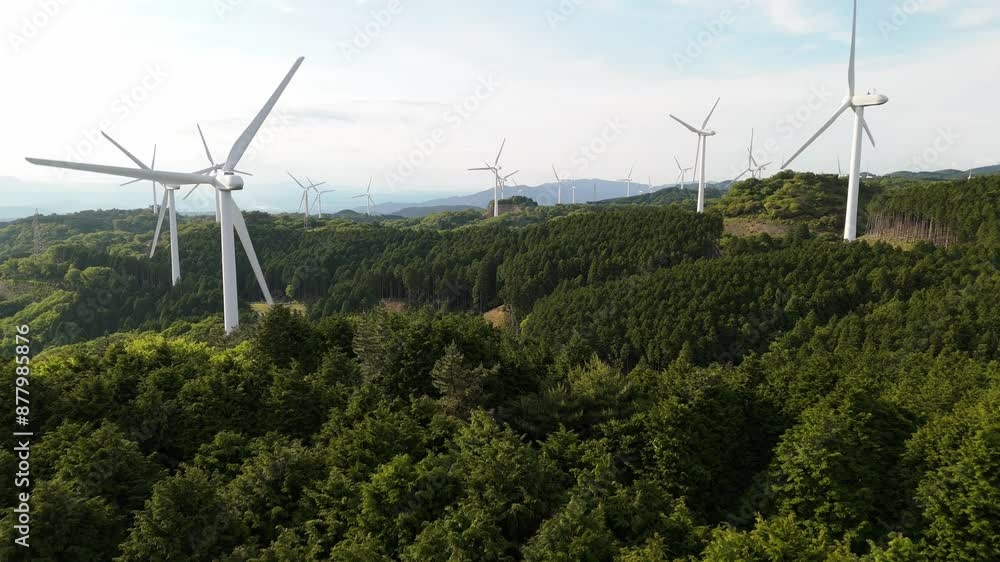 A cluster of wind turbines for generating electric power in a valley ...
