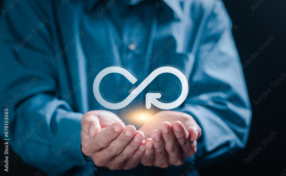 Circular economy and infinite concept, businessman holding circular ...