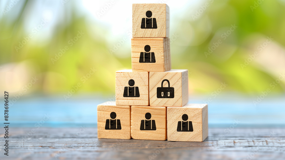 Pyramid Structure of Employee Icons on Wooden Blocks. Professional Team ...