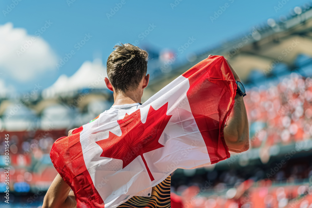 Canadian Runner Celebrates Olympic Victory in Paris. A young male ...