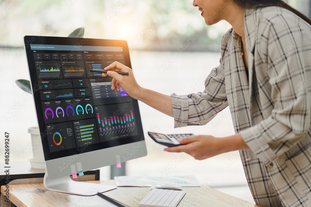 Professional data analyst using data visualizations dashboard on ...