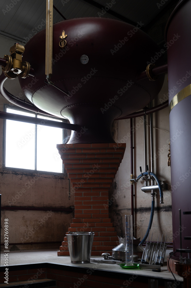 Double distillation process of cognac spirit in Charentias copper ...