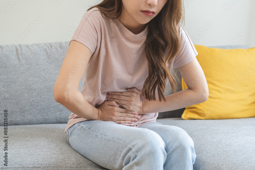Flatulence asian young woman intolerance hand in stomach ache, suffer ...