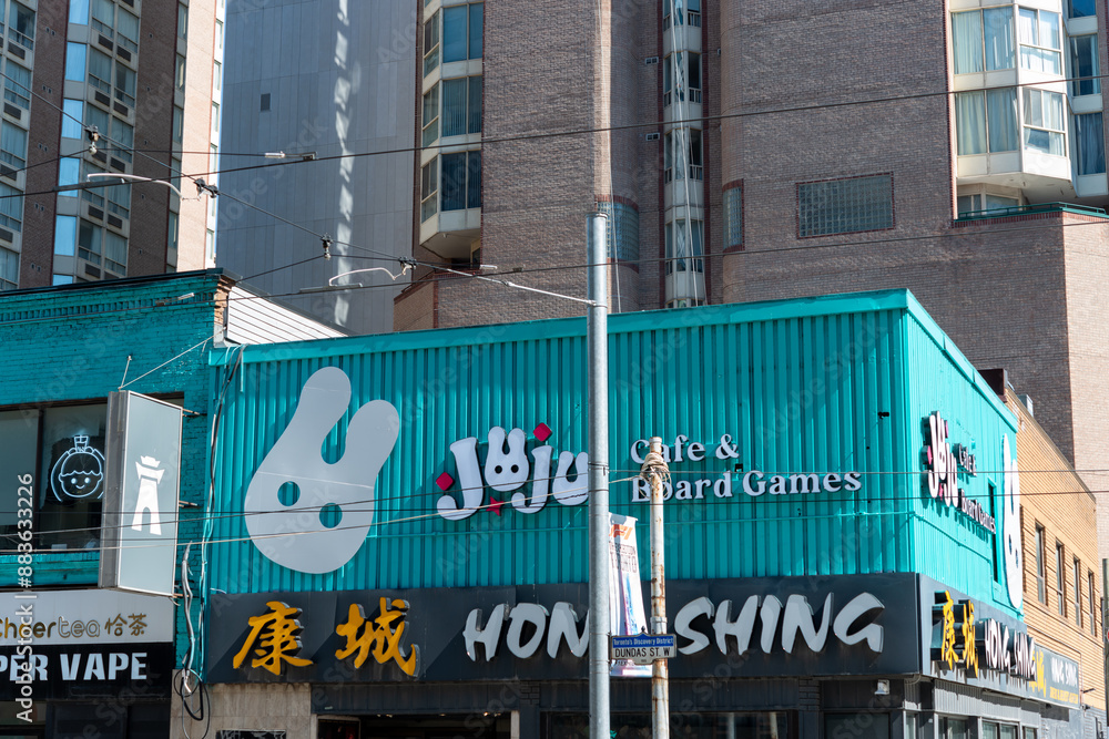 exterior building and sign of Juju Cafe & Board Games and Hong Shing ...