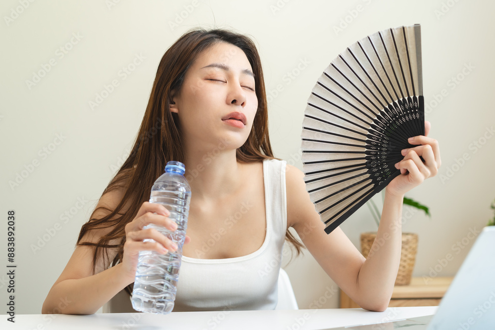 Heat wave in summertime concept, Woman feeling hot from the heat wave ...