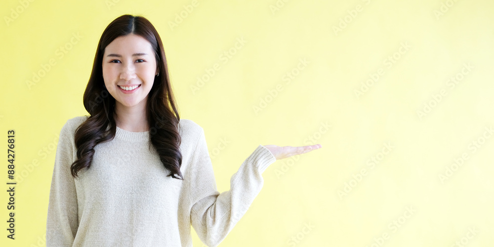 Happy young asian woman plam upplam, for presenting product mock up ...