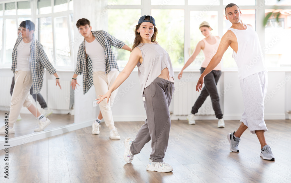 Foto de During hip hop dance lesson, girl leads, conducts classes ...