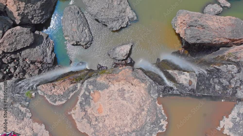 This footage captures a stunning top-down view of a Waterfall in ...