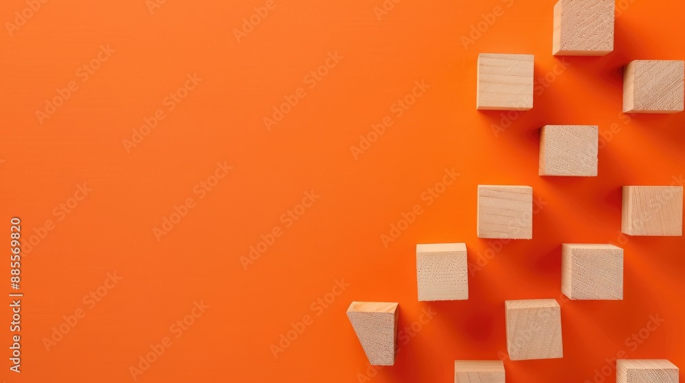 Orange background with wooden blocks forming a timeline with milestones ...