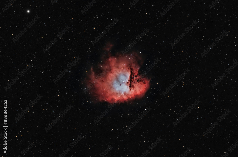Roughly 9,200 light years from Earth, the Pacman Nebula (NGC 281) is an ...