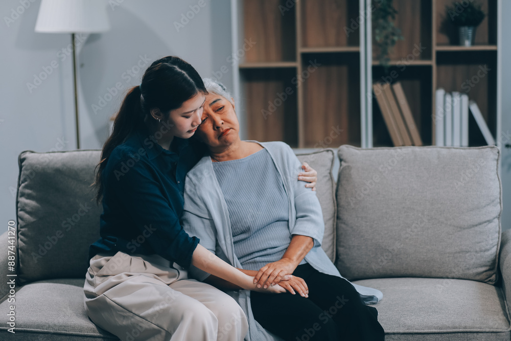 Sad teen granddaughter hugging depressed mature grandmother, giving ...