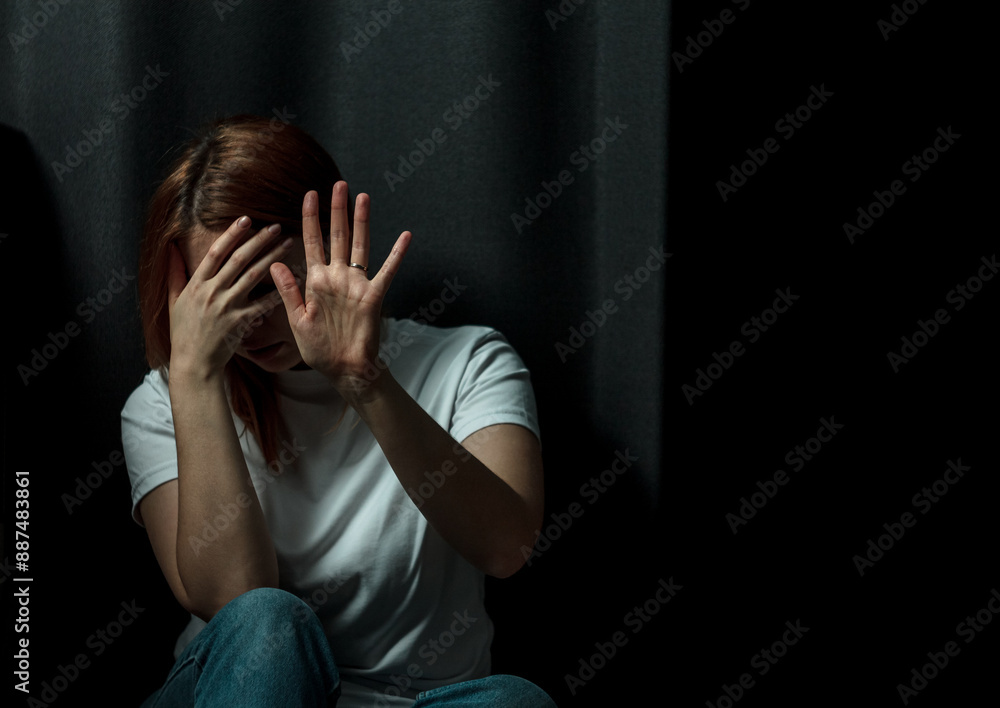 The woman in the photo looks depressed and scared, she has suffered ...