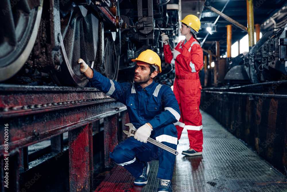 Team of engineer railway wearing safety uniform and helmet under ...