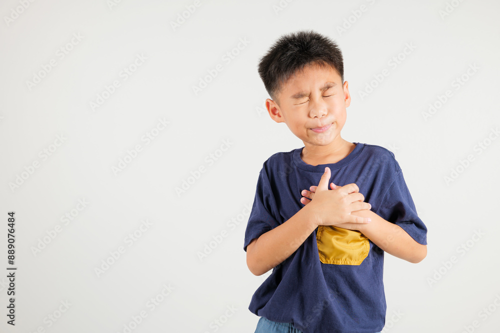 Young kid boy pressing on chest pain isolated on white background ...
