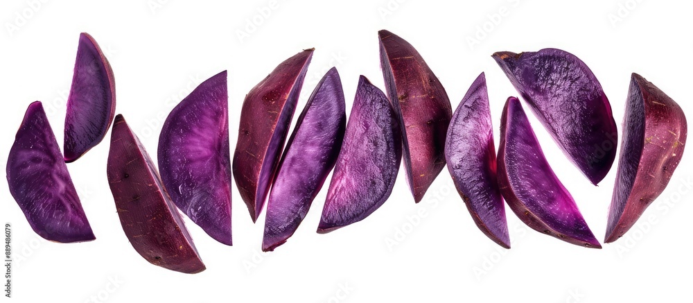 Purple sweet potatoes with rough edges, isolated on a white background ...