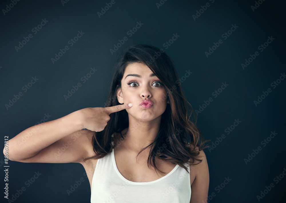 Portrait, pointing and woman with pout, lipstick and cosmetics on dark ...