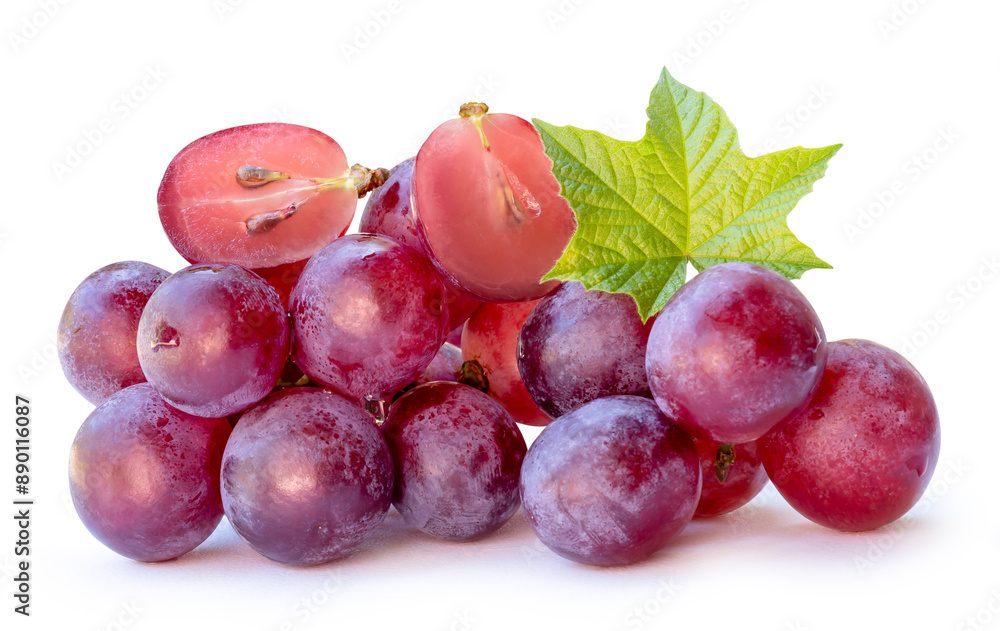 Front view of red grapes or purple grapes with halves and green leaf ...