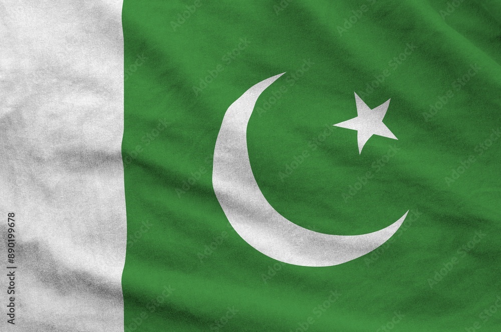 Pakistan flag depicted on folded wavy fabric of old cloth close up ...