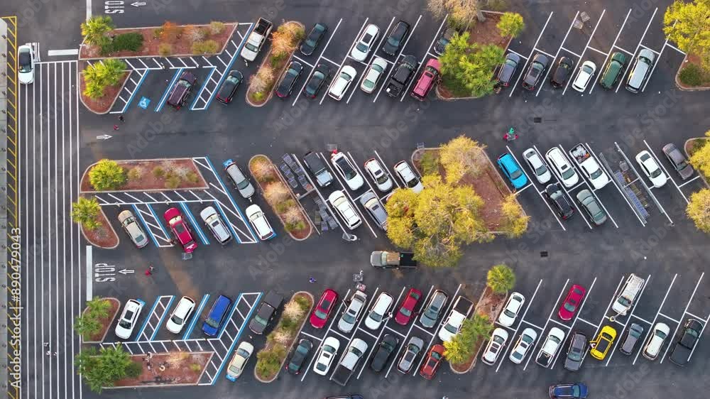 Large parking lot with many parked cars. Big carpark at supercenter ...