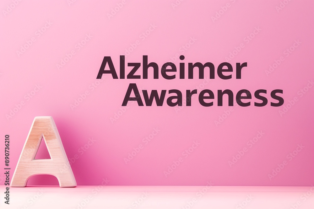 The phrase "Alzheimer Awareness" in bold text on a pink background with ...