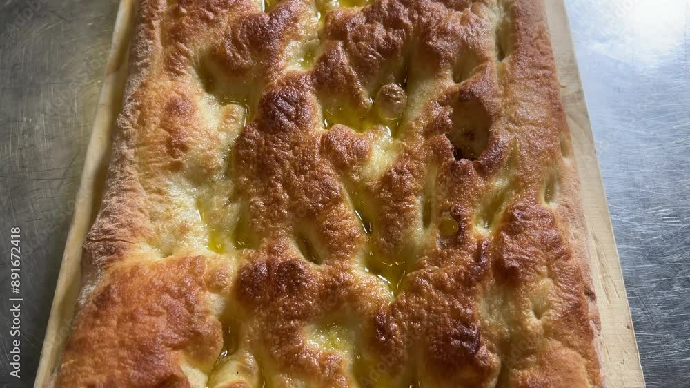 Focaccia with extra virgin olive oil, typical flat bread of Genoa ...