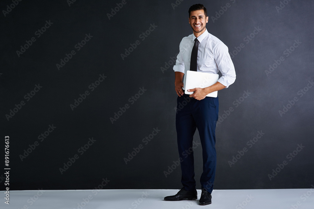 Business man, laptop and studio by space for mockup, pride or smile in ...