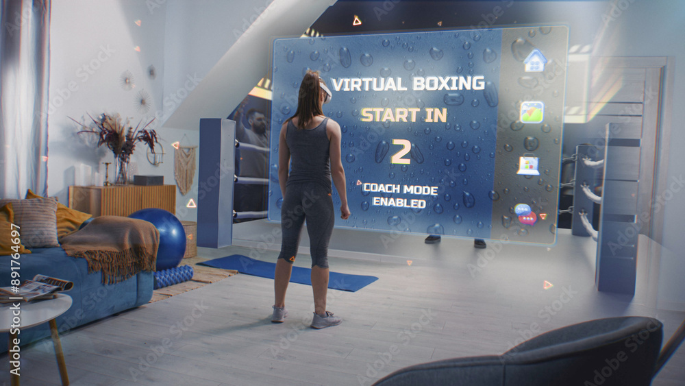 Foto de Female athlete wearing augmented reality headset starts boxing ... Foto de Female athlete wearing augmented reality headset starts boxing ...