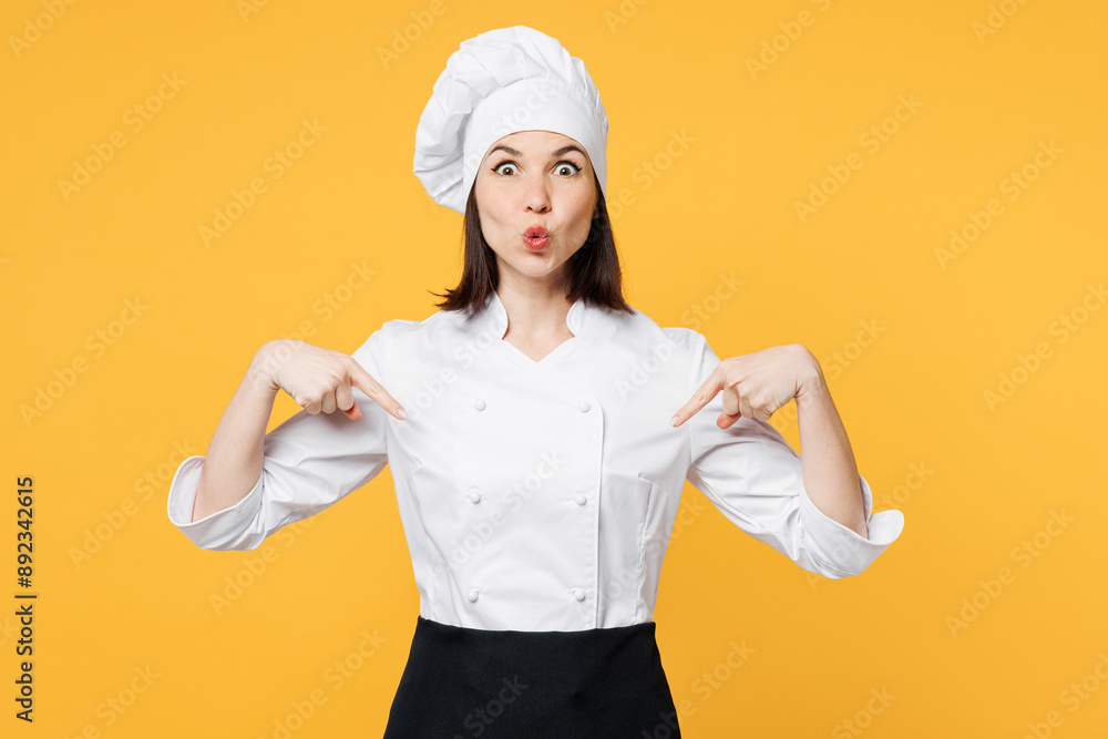 Young surprised chef cook baker woman she wear white shirt black apron ...