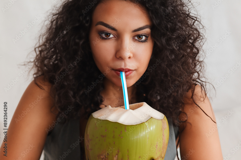 Woman resting on coconut after drinking a coconut. cocktail beach water ...