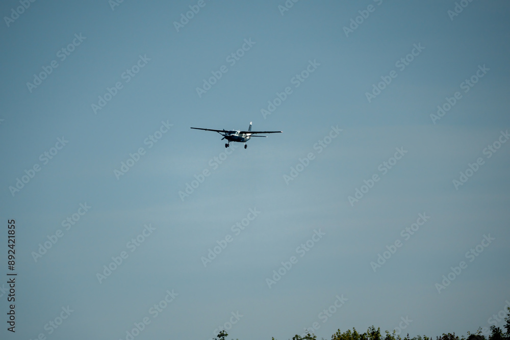 Cessna Grand Caravan G-BZAH blue and white fixed wing aircraft on final ...
