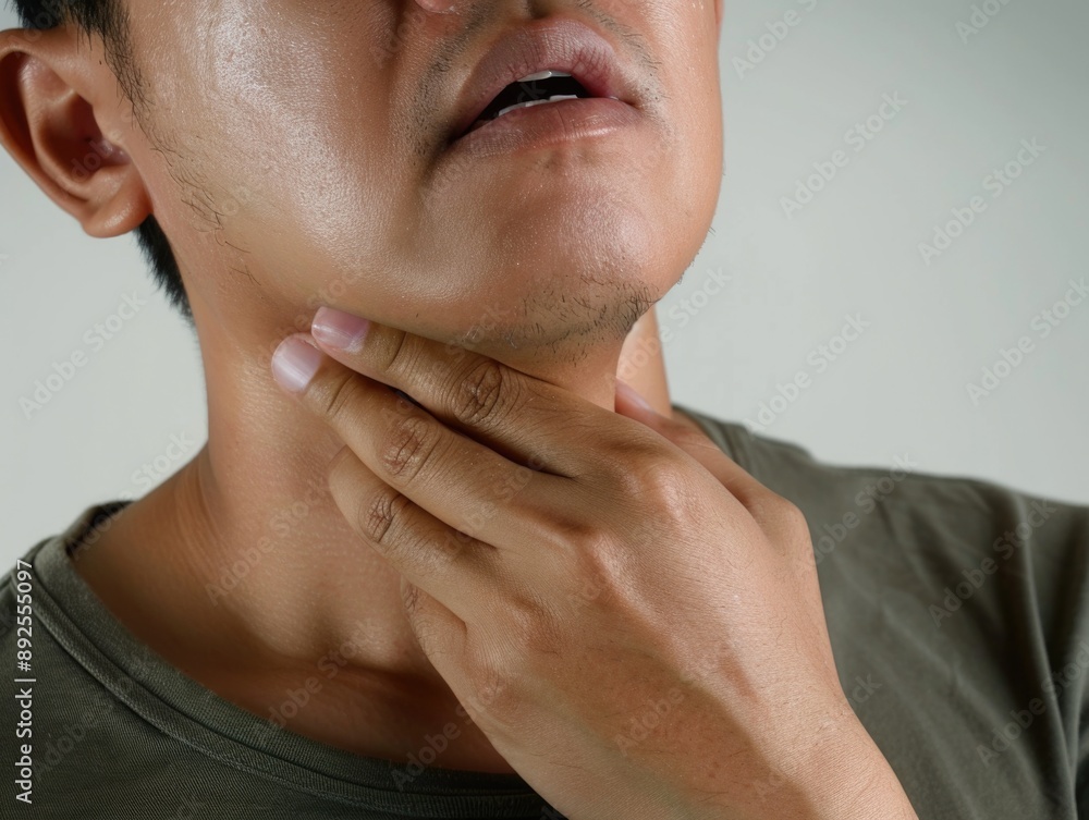 A person reflecting on their emotions and thoughts with hand on chest ...