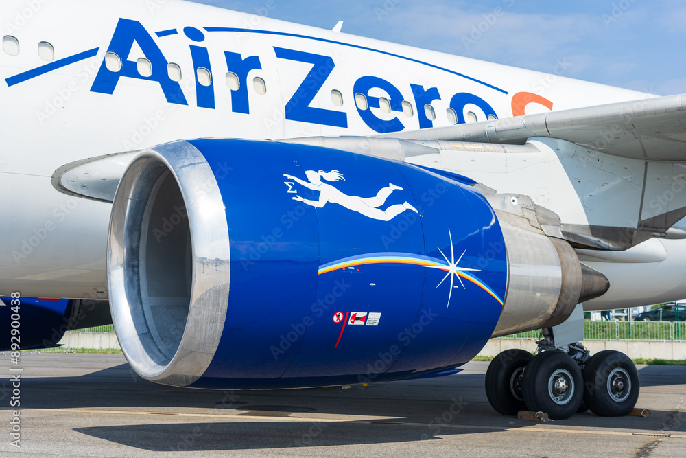 BERLIN - JUNE 07, 2024: The turbofun engine of a wide-body aircraft ...