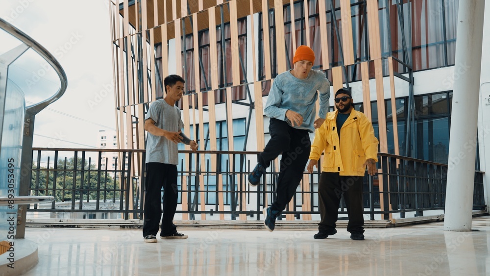 Hip hop team dance break dance while multicultural friend surrounded ...