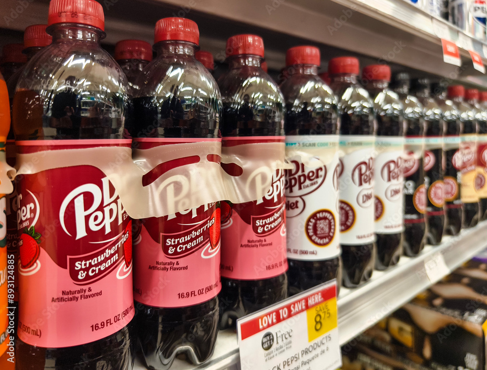Variety of Dr Pepper bottles on store shelf Stock Photo | Adobe Stock