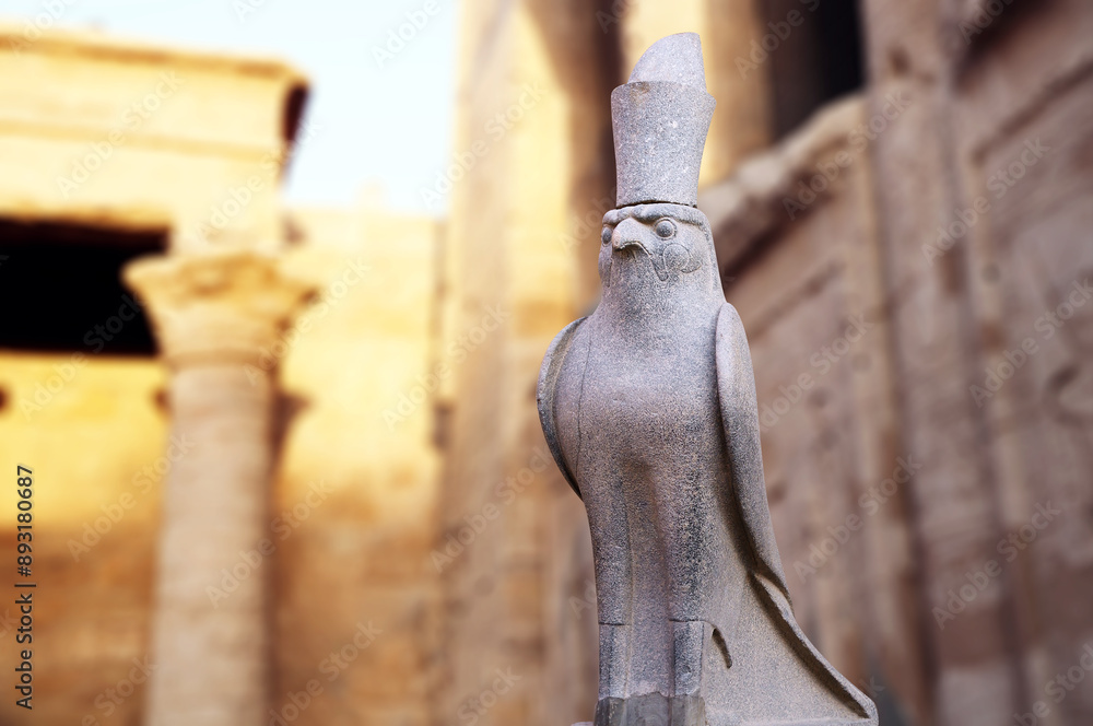 Granite statue of God Horus falcon at entrance Temple of Horus, Edfu ...