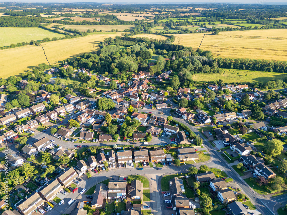 Drone view of a typical Essex, UK village seen from height. The ...