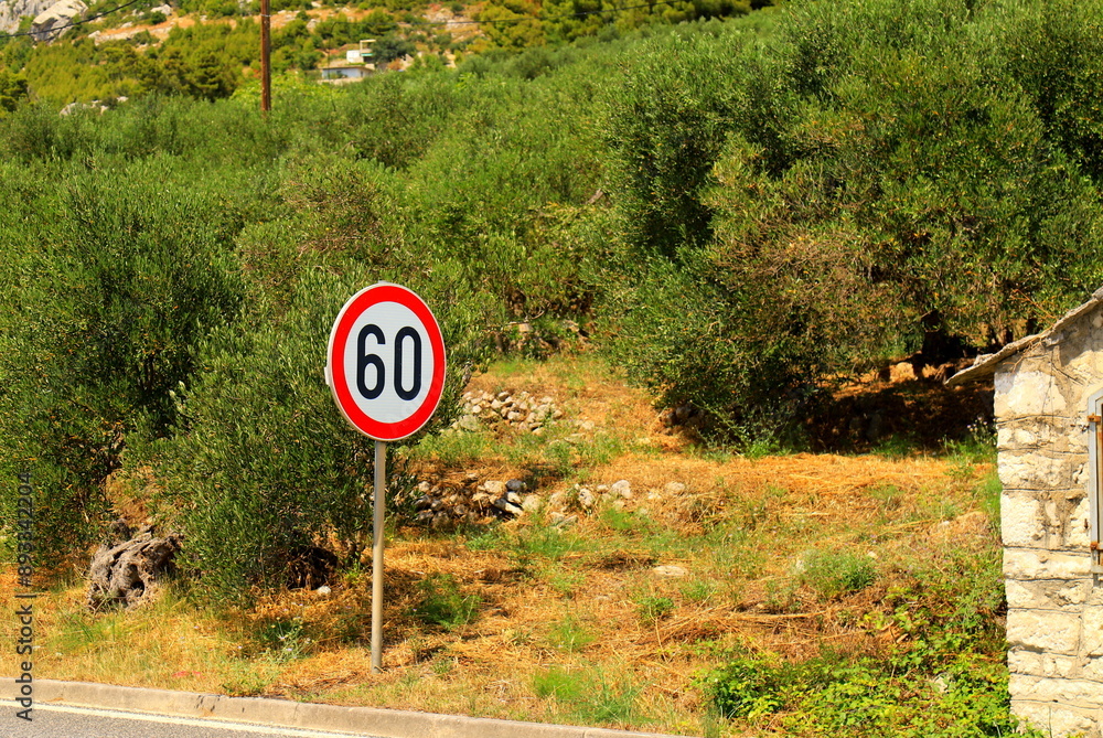 Traffic sign 60, Speed limit 60, on mountain road in Croatia Speed ...
