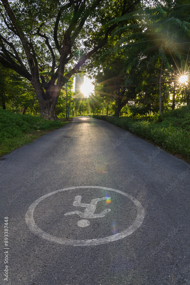 The symbol of the walk lane in a green park with beautiful sunlight at ...