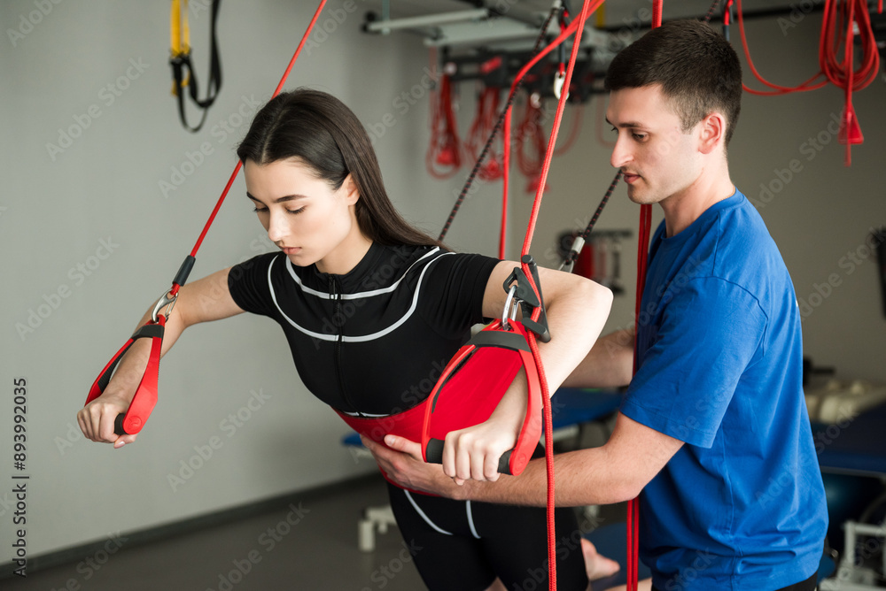 Supervised red cord physiotherapy at rehabilitation center. Pain-free ...